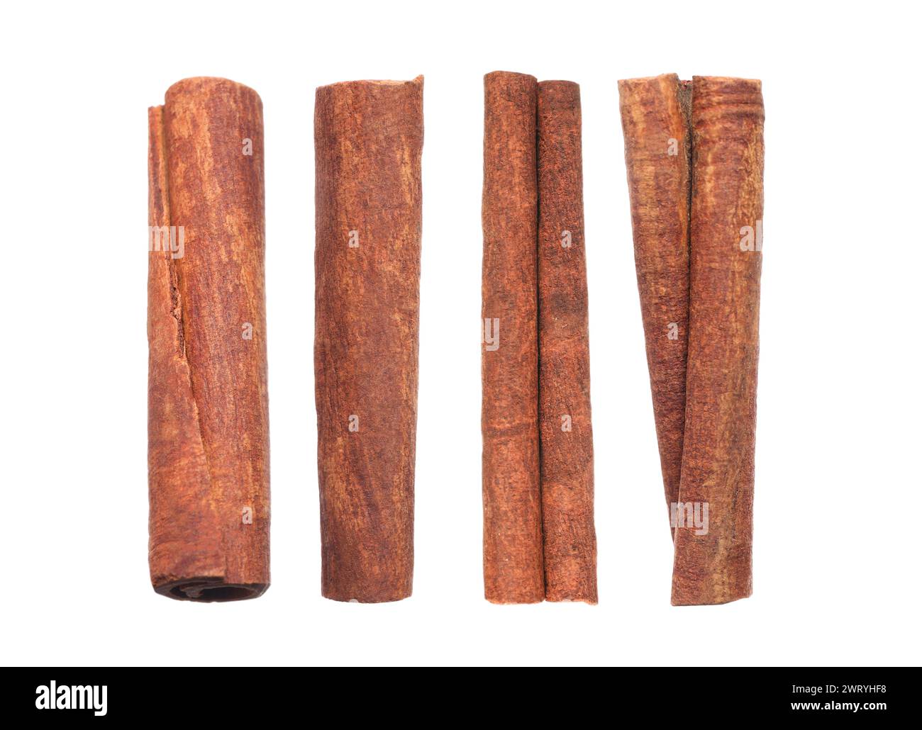 Aromatic dry cinnamon sticks isolated on white, set Stock Photo - Alamy