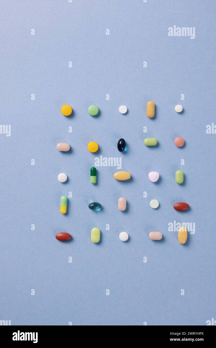 colorful pills arranged in a square shape Stock Photo - Alamy