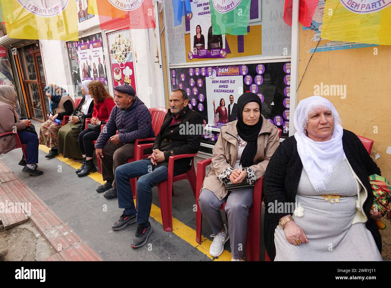 Diyarbakir, Turkey. 14th Mar, 2024. Party members are seen sitting in ...