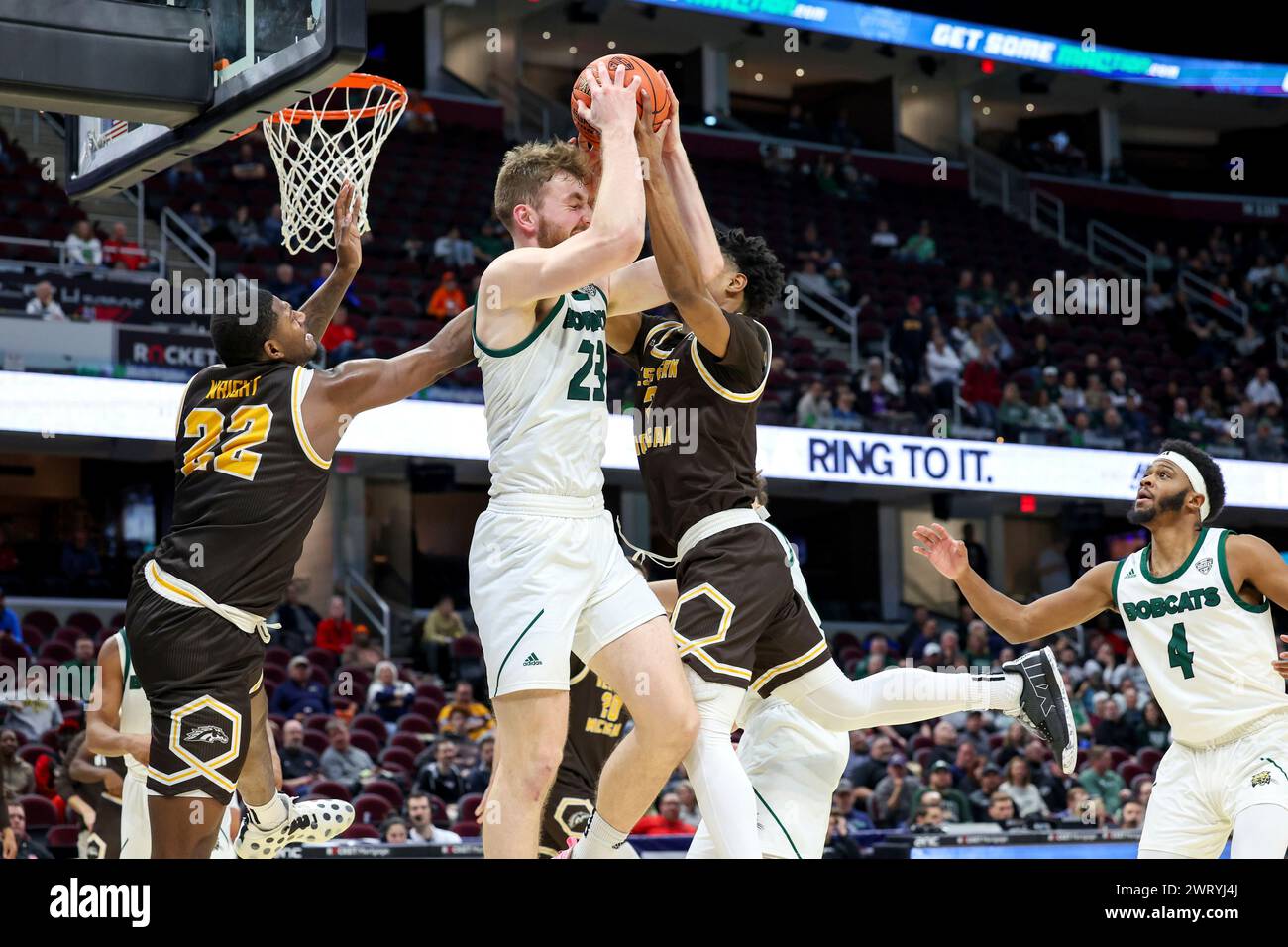 CLEVELAND, OH - MARCH 14: Ohio Bobcats forward AJ Clayton (23) battles ...