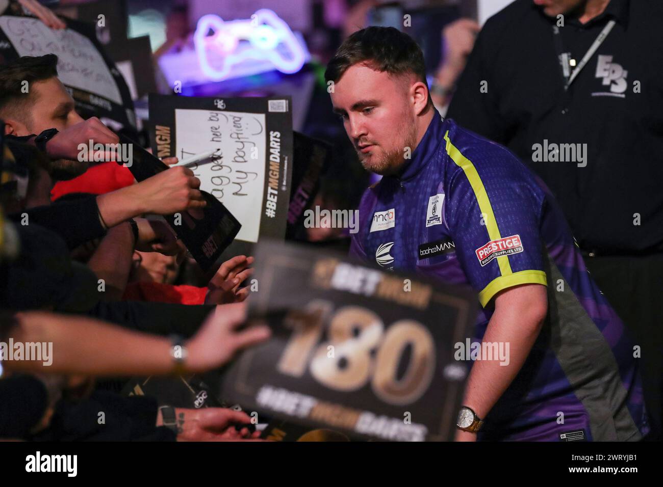 Nottingham, UK. 14th Mar, 2024. Luke Littler signs autographs on walk ...