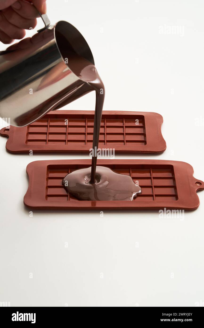 Melted chocolate poured mold hi-res stock photography and images - Alamy