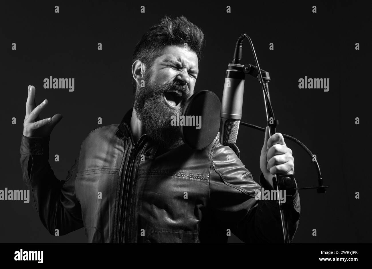 Man singing in recording studio Black and White Stock Photos & Images ...