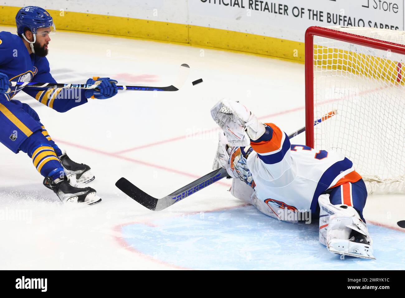 Buffalo Sabres left wing Jordan Greenway, left, is stopped by New York ...