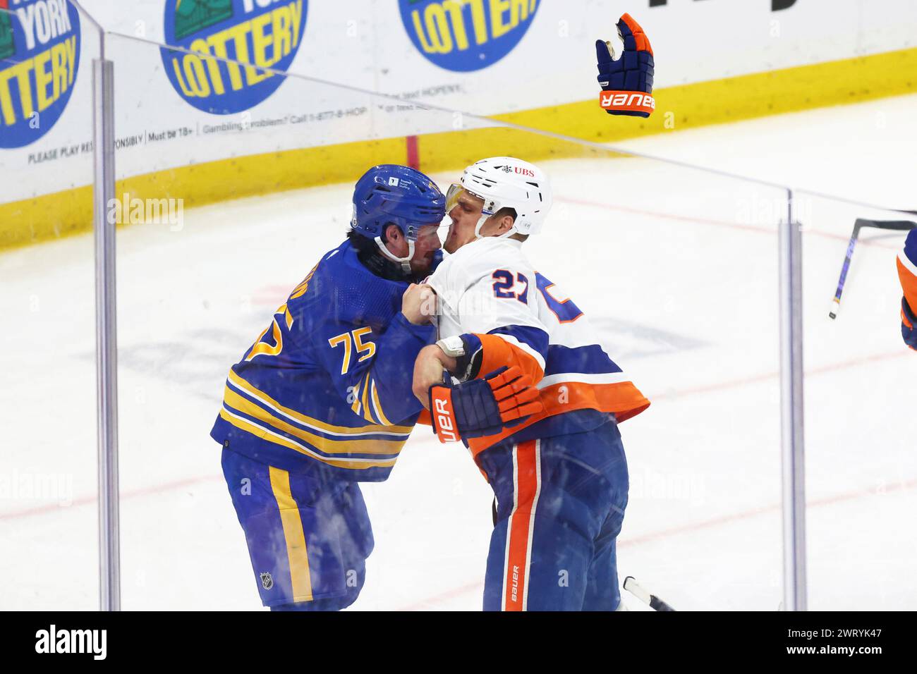 Buffalo Sabres defenseman Connor Clifton (75) and New York Islanders ...