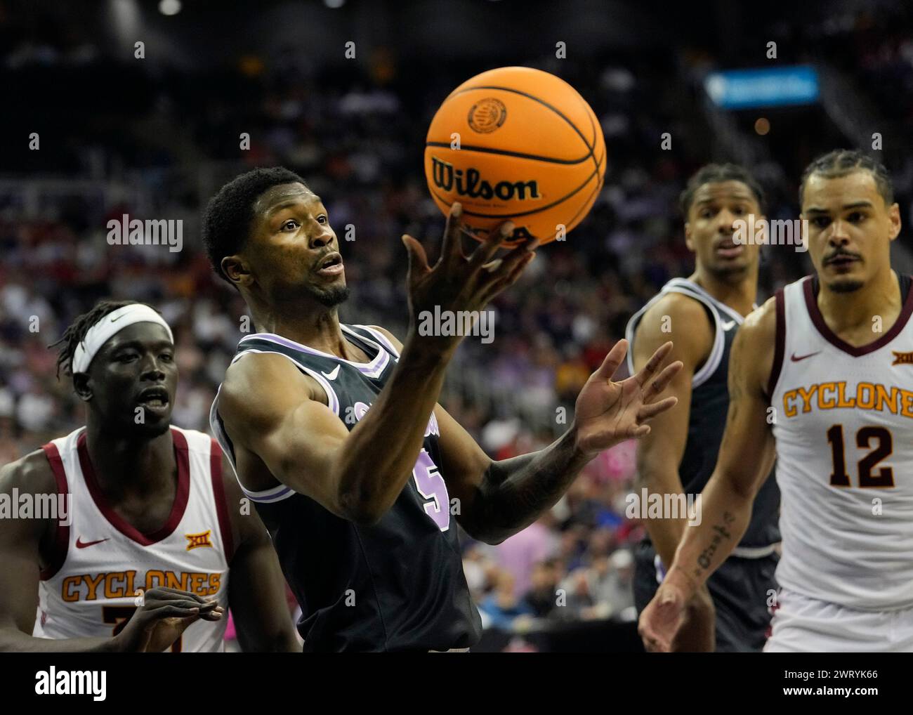 MAR 14 2024: Kansas State Wildcats guard Cam Carter (5) pulls in a ...