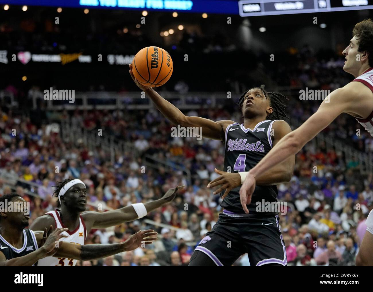 MAR 14 2024: Kansas State Wildcats guard Dai Dai Ames (4) shoots a ...