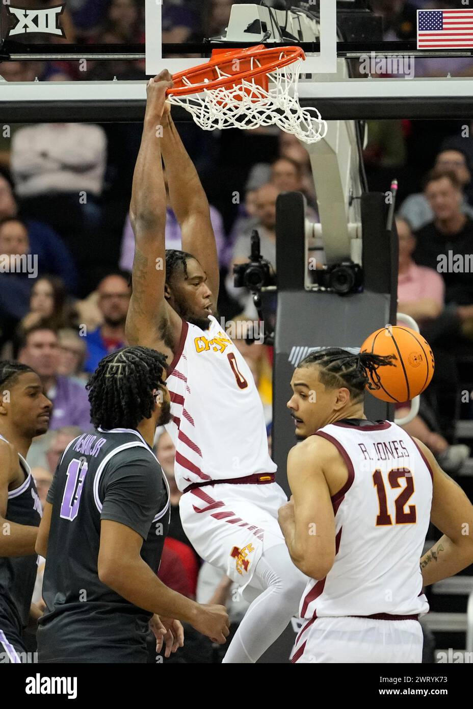 MAR 14 2024: Iowa State Cyclones forward Tre King (0) slams it home in ...