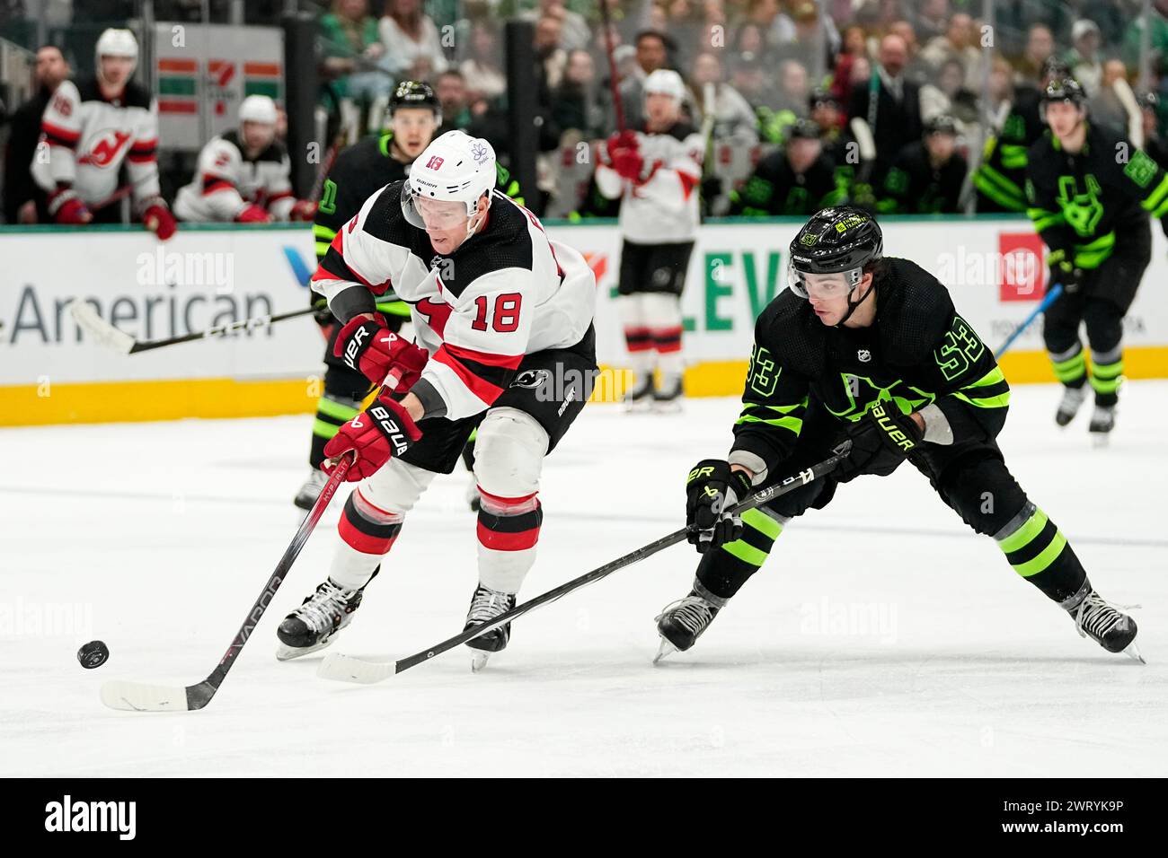 New Jersey Devils left wing Ondrej Palat (18) moves to take control of ...