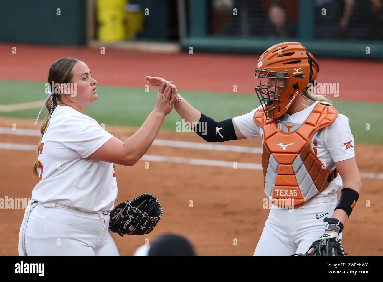 AUSTIN, TX - MARCH 14: Texas pitcher Mac Morgan (55) adn Texas catcher ...