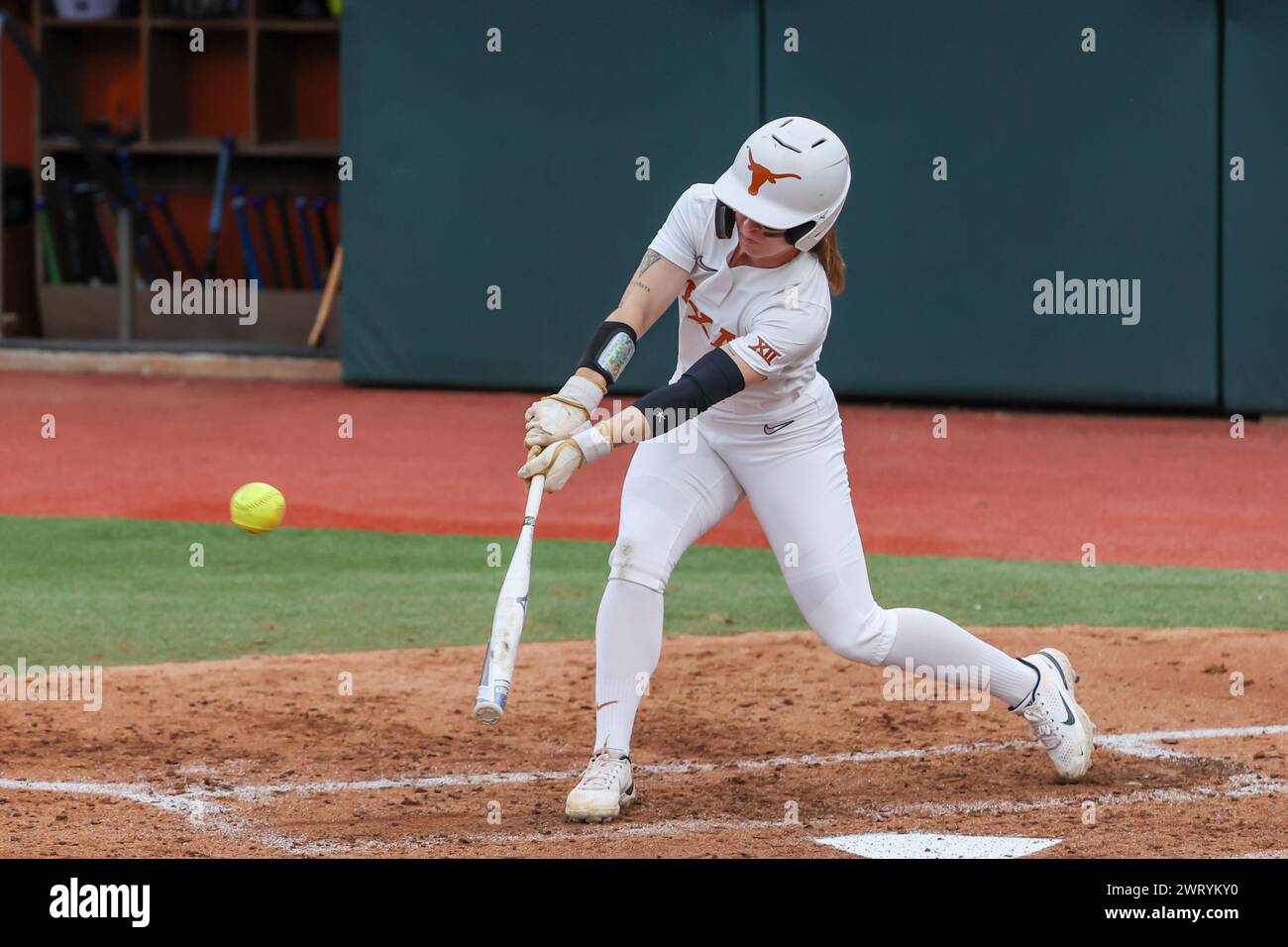 AUSTIN, TX - MARCH 14: Texas outfielder Bella Dayton (6) hits the ball ...