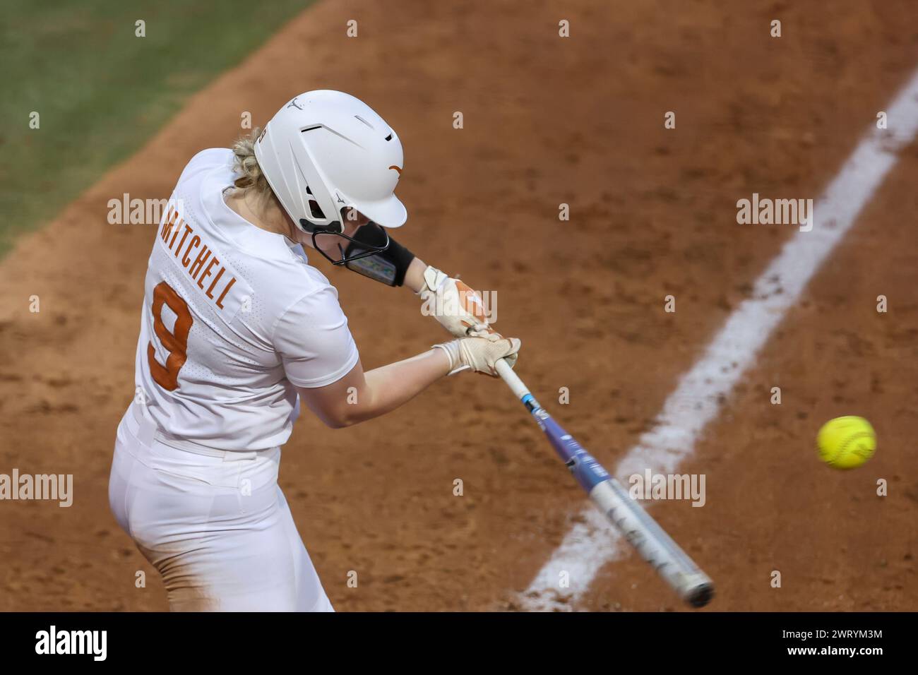 AUSTIN, TX - MARCH 14: Texas infielder Joley Mitchell (9) hits a home ...