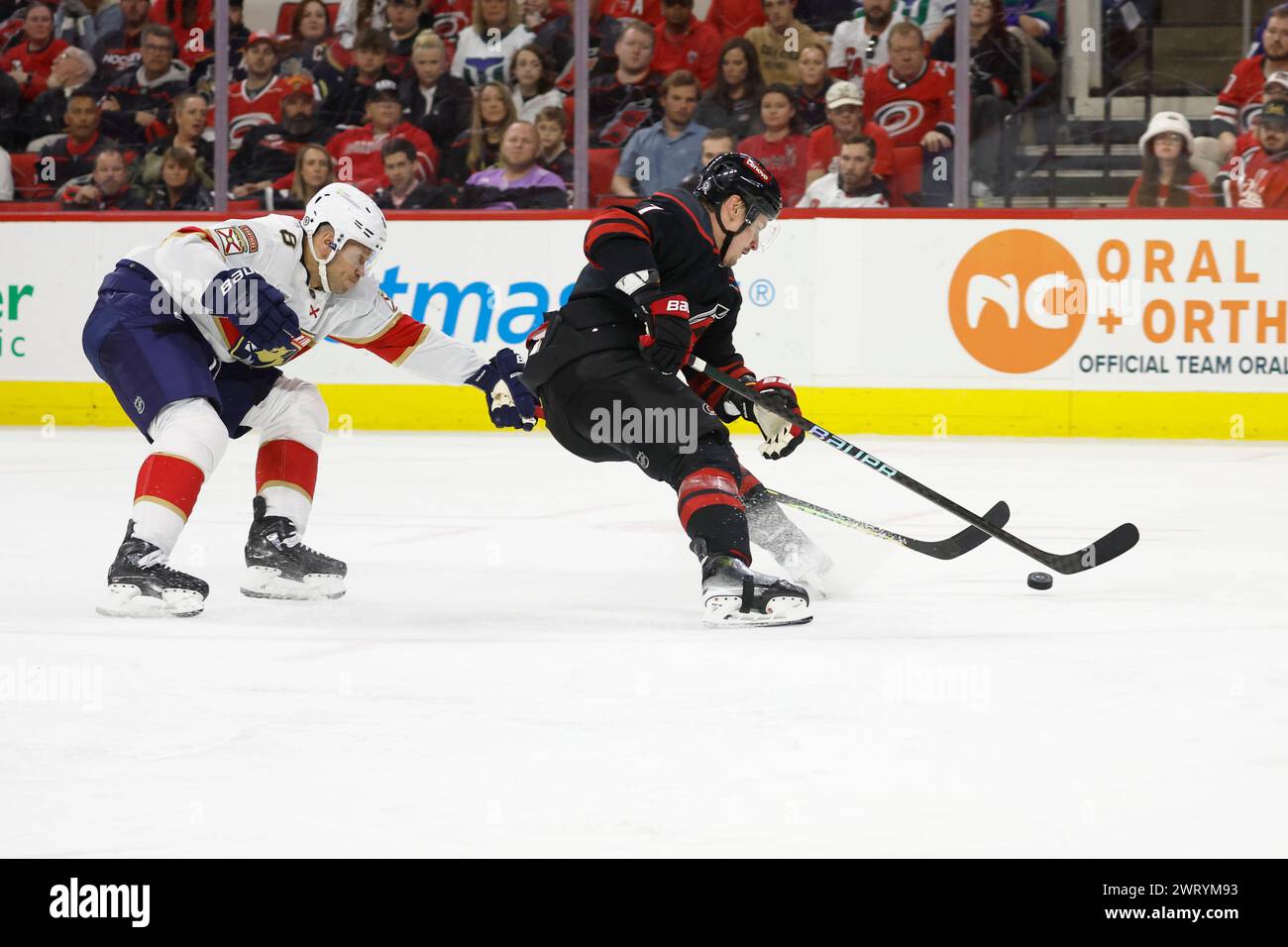 Florida Panthers Kyle Okposo (8) chases the puck controlled by Carolina ...