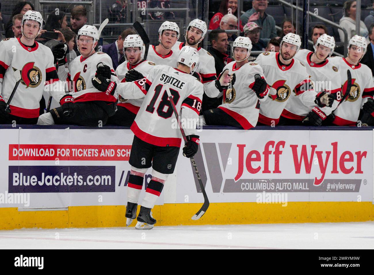Ottawa Senators' Tim Stutzle (18) celebrates with teammates after ...