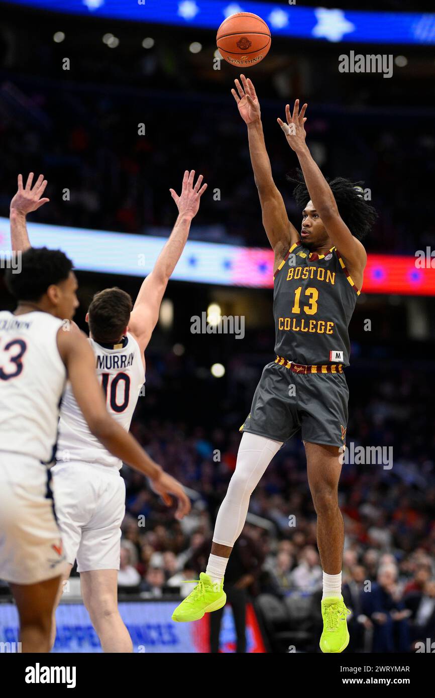 Boston College guard Donald Hand Jr. (13) shoots over Virginia guard ...
