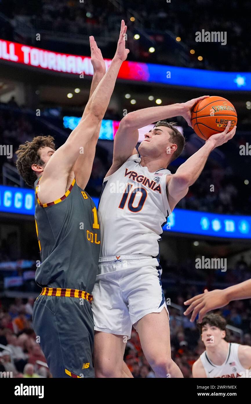 Virginia guard Taine Murray (10) collides with Boston College forward ...