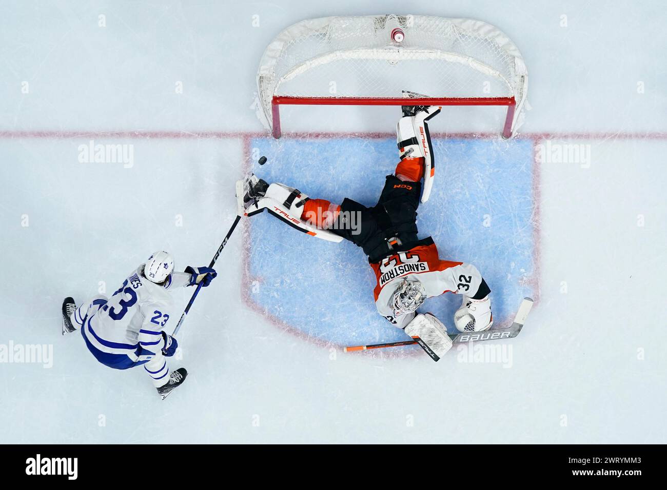Toronto Maple Leafs' Matthew Knies, left, scores a goal against ...