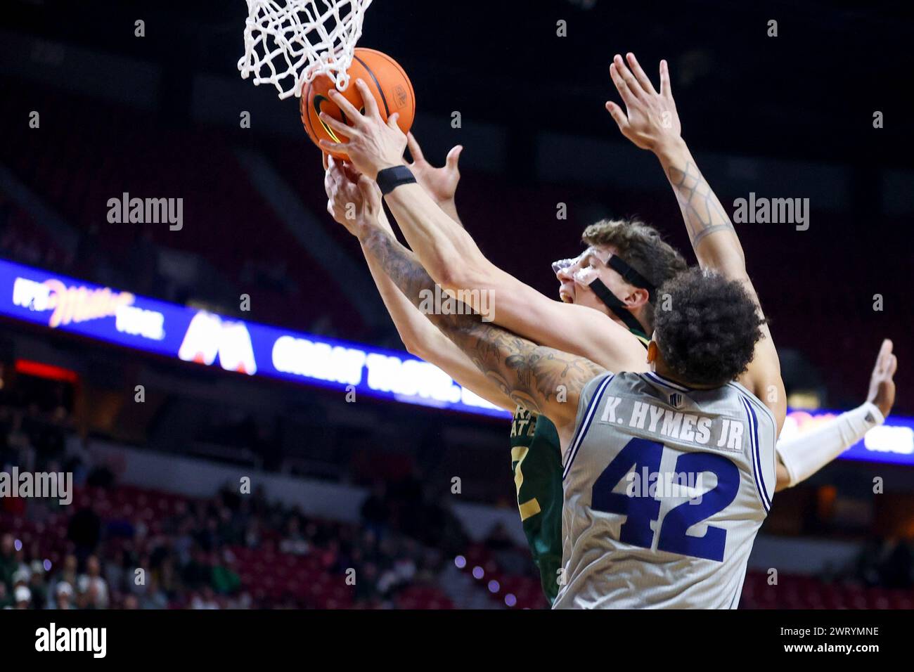 Colorado State forward Patrick Cartier (12) shoots over Nevada forward ...