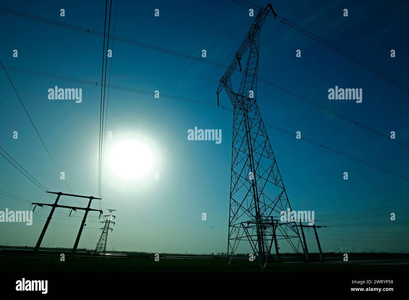 Pole and tower of high voltage Stock Photo - Alamy