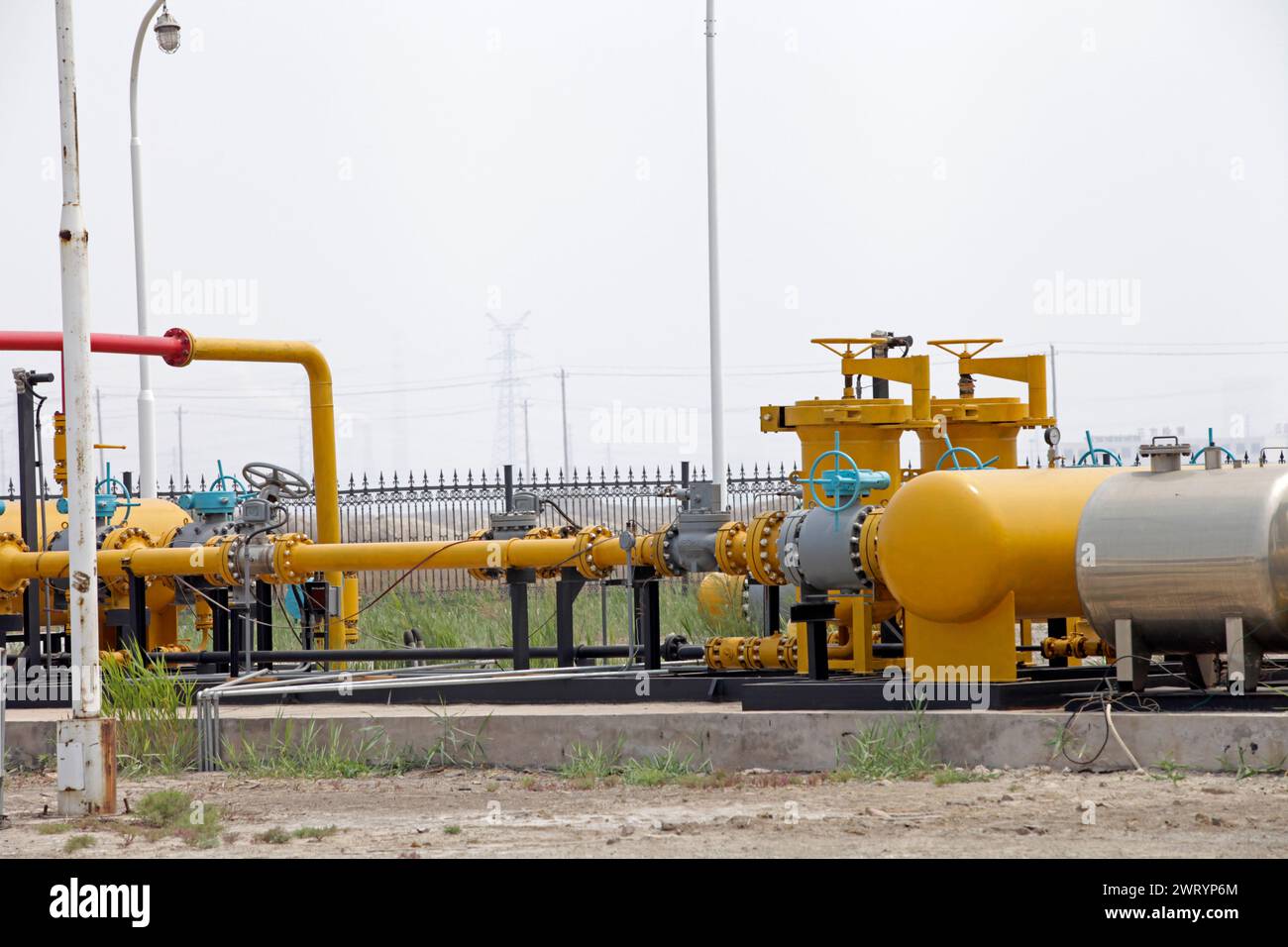 Oilfield equipment and pipeline Stock Photo - Alamy