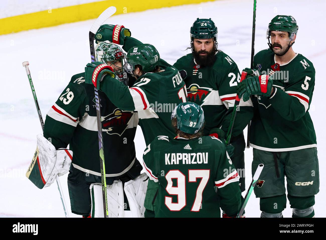 Minnesota Wild left wing Marcus Foligno (17) celebrates with teammates ...