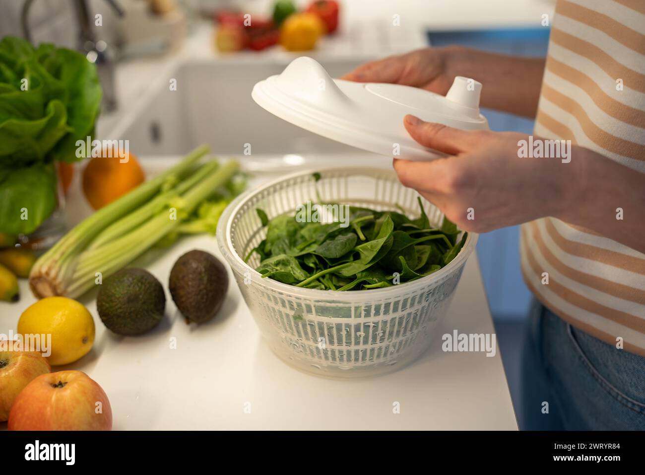 Cooking of quick fresh healthy dinner by prepare of green spinach ...