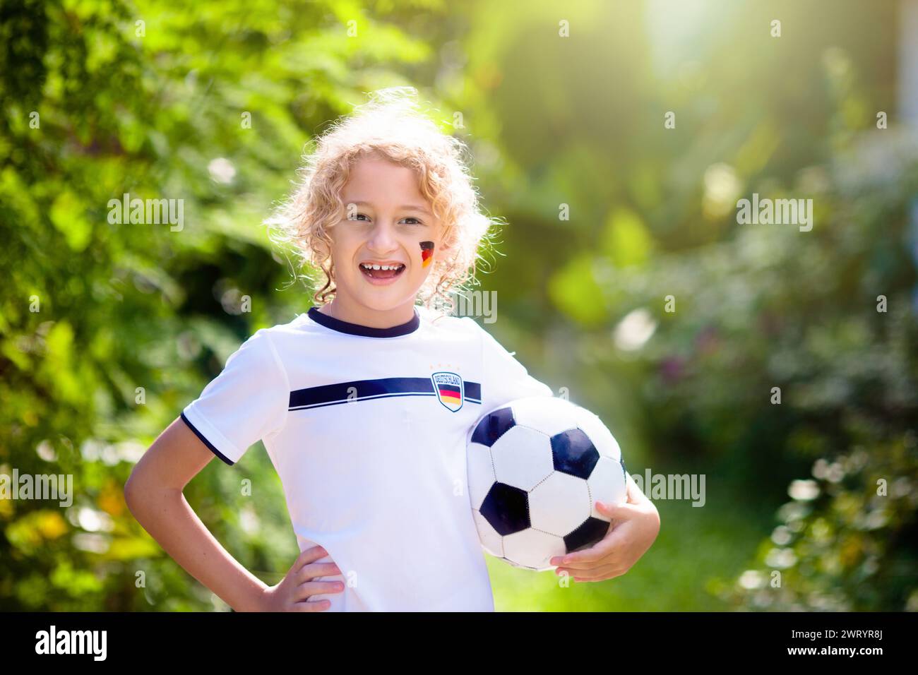 Germany kids playing football hi-res stock photography and images - Alamy