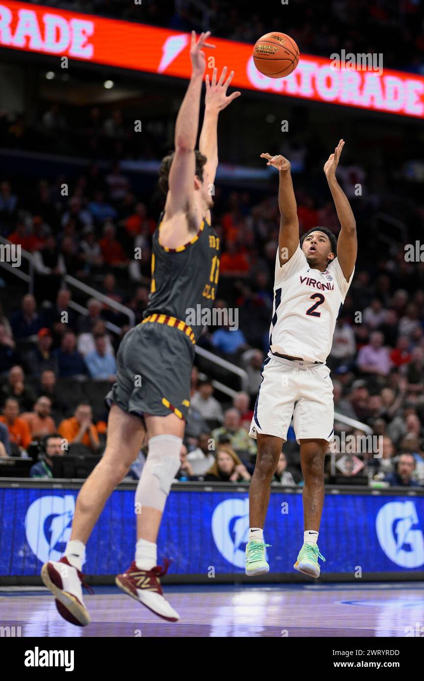 Virginia guard Reece Beekman (2) shoots over Boston College forward ...