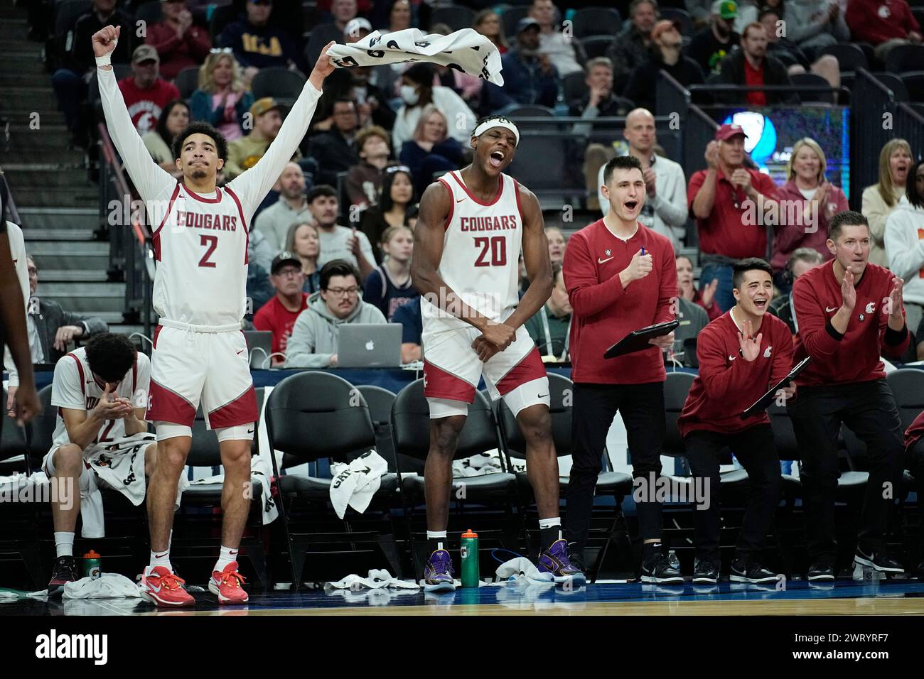 Washington State guard Myles Rice (2) and center Rueben Chinyelu (20 ...
