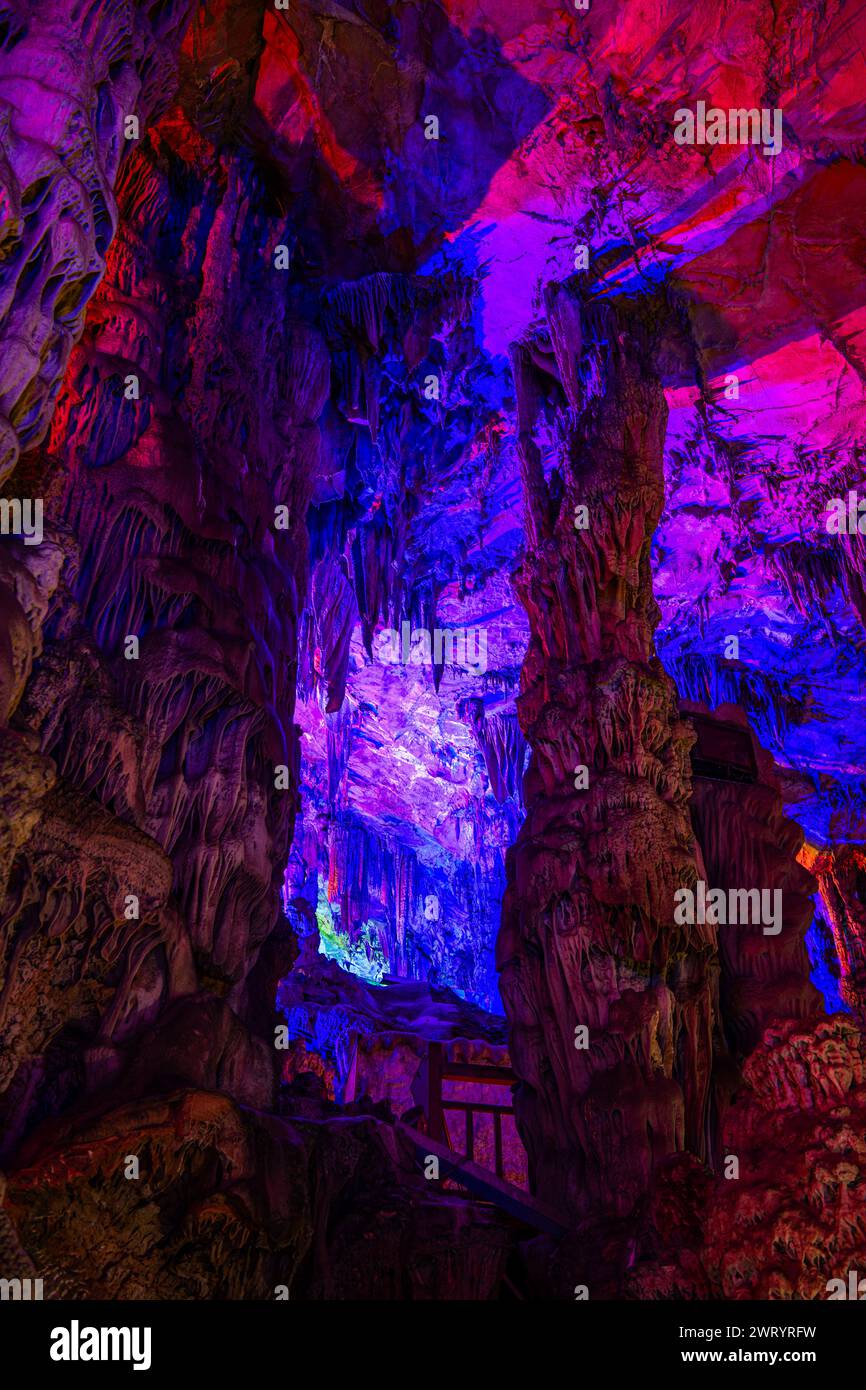 Underground lake in Reed Flute Caves in Guilin, China. Vertical ...