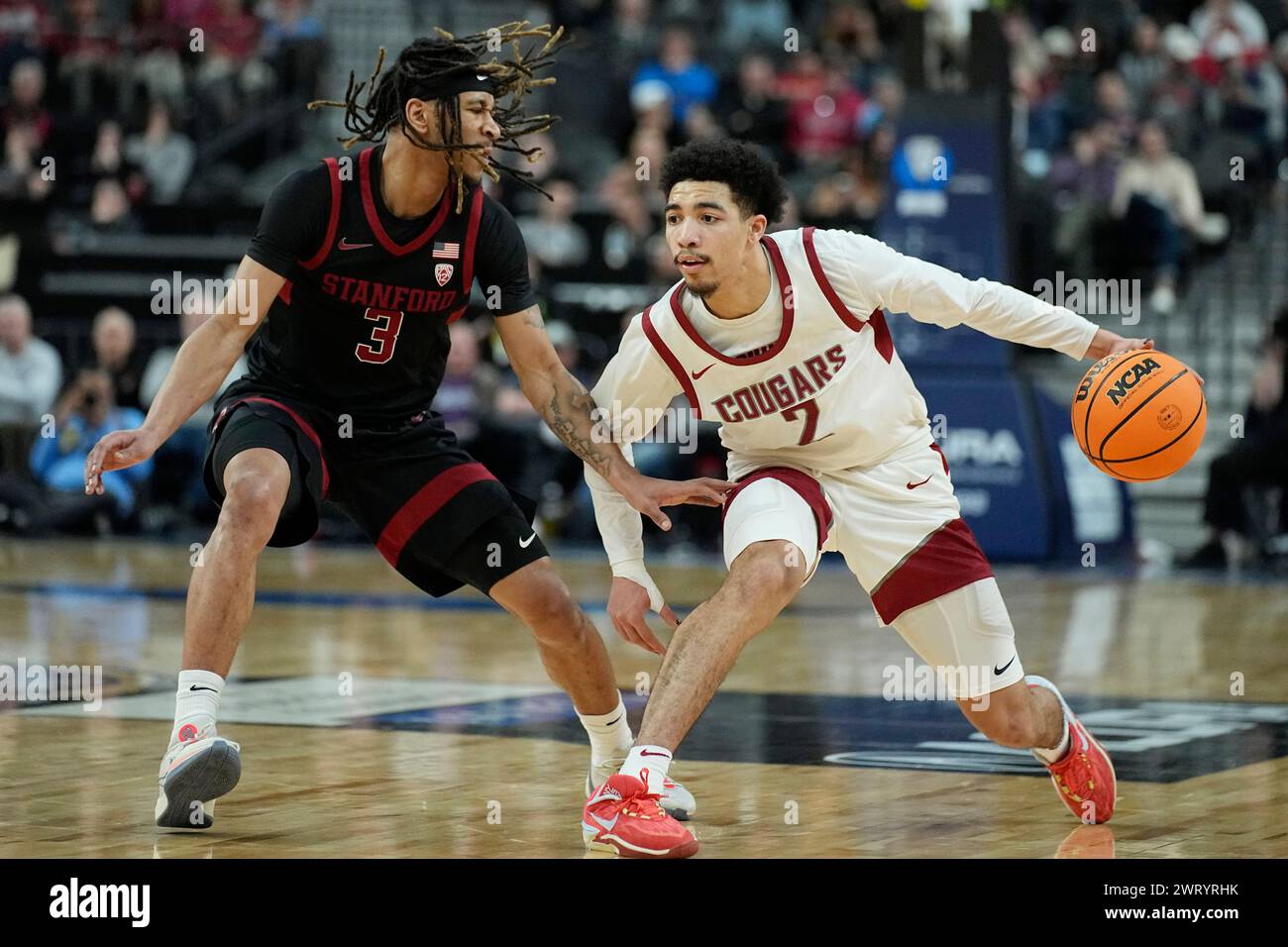 Washington State guard Myles Rice (2) drives against Stanford guard ...