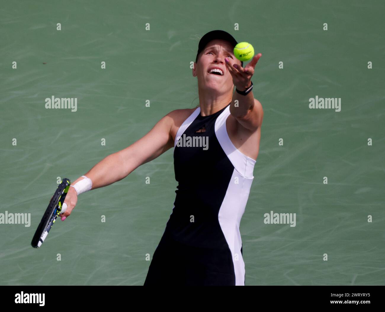 March 14, 2024 Caroline Wozniacki of Denmark serves against Iga Swiatek ...