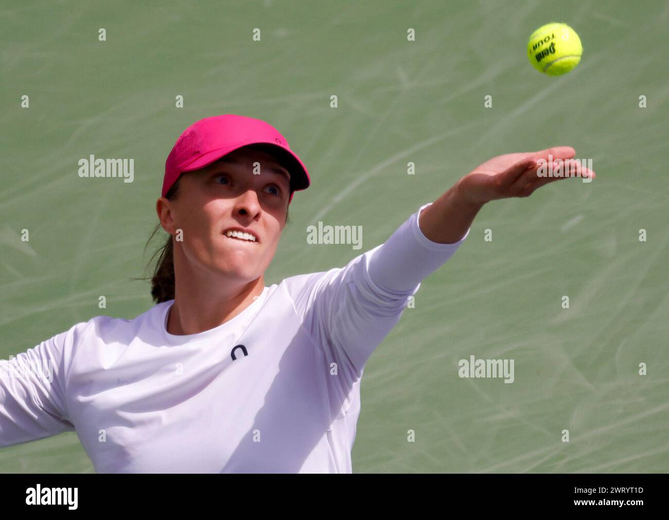 March 14, 2024 Iga Swiatek of Poland serves against Caroline Wozniacki ...