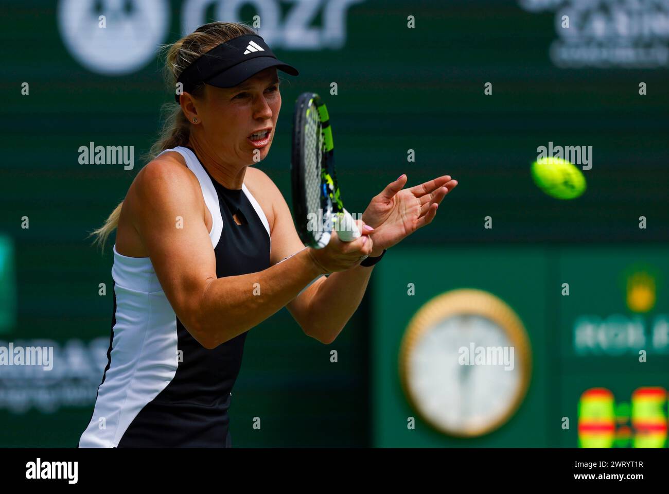 March 14, 2024 Caroline Wozniacki of Denmark plays a forehand against ...