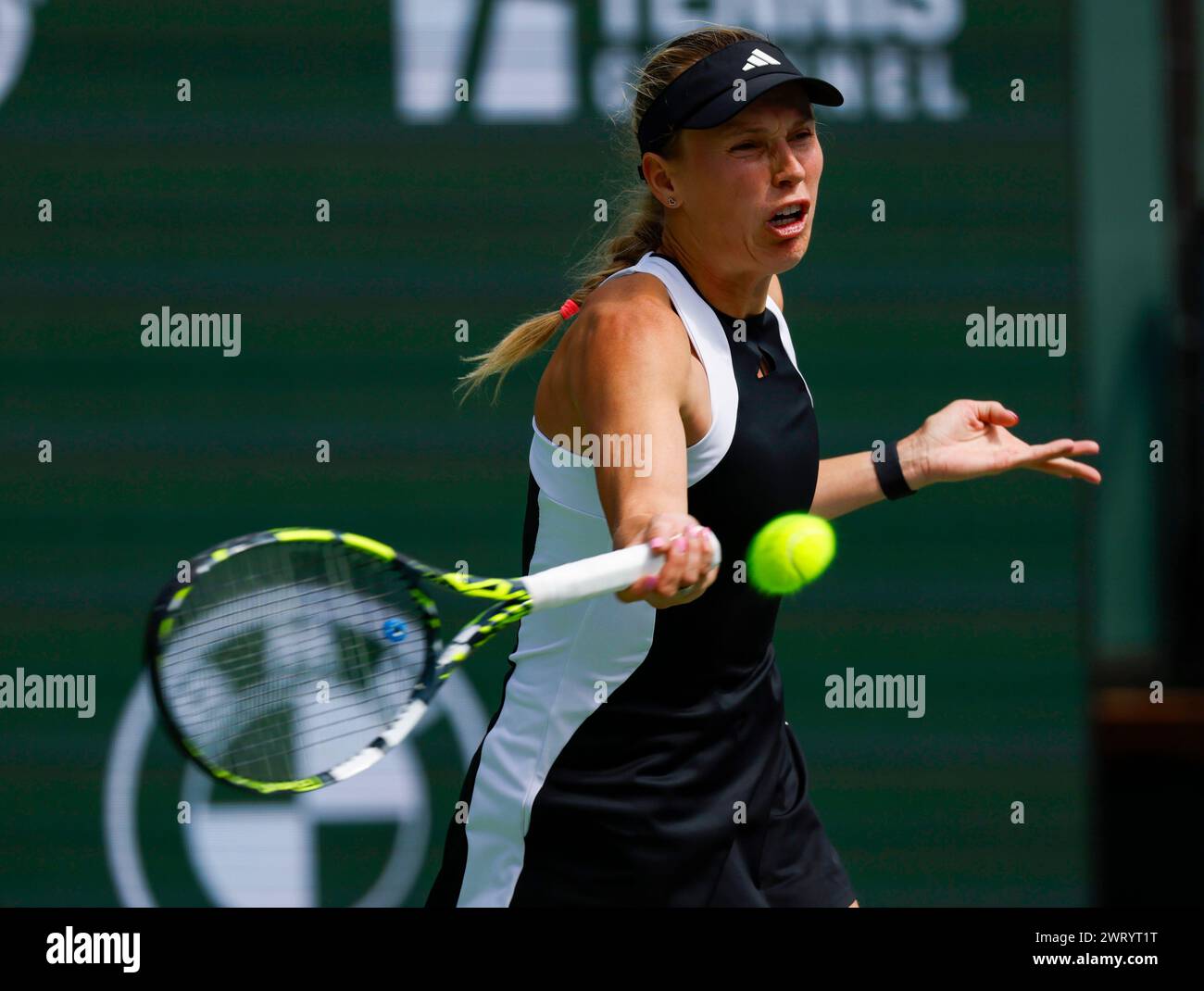 March 14, 2024 Caroline Wozniacki of Denmark plays a forehand against ...