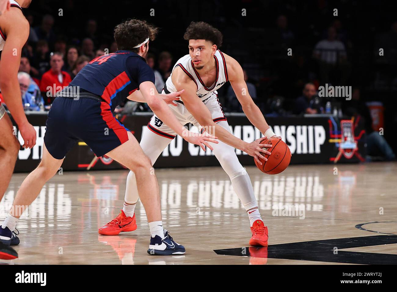 BROOKLYN, NY - MARCH 14: Koby Brea #4 of the Dayton Flyers controls the ...