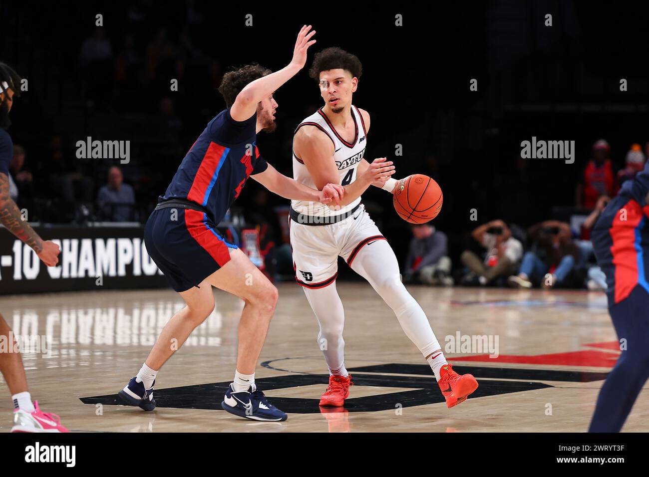 BROOKLYN, NY - MARCH 14: Koby Brea #4 of the Dayton Flyers controls the ...