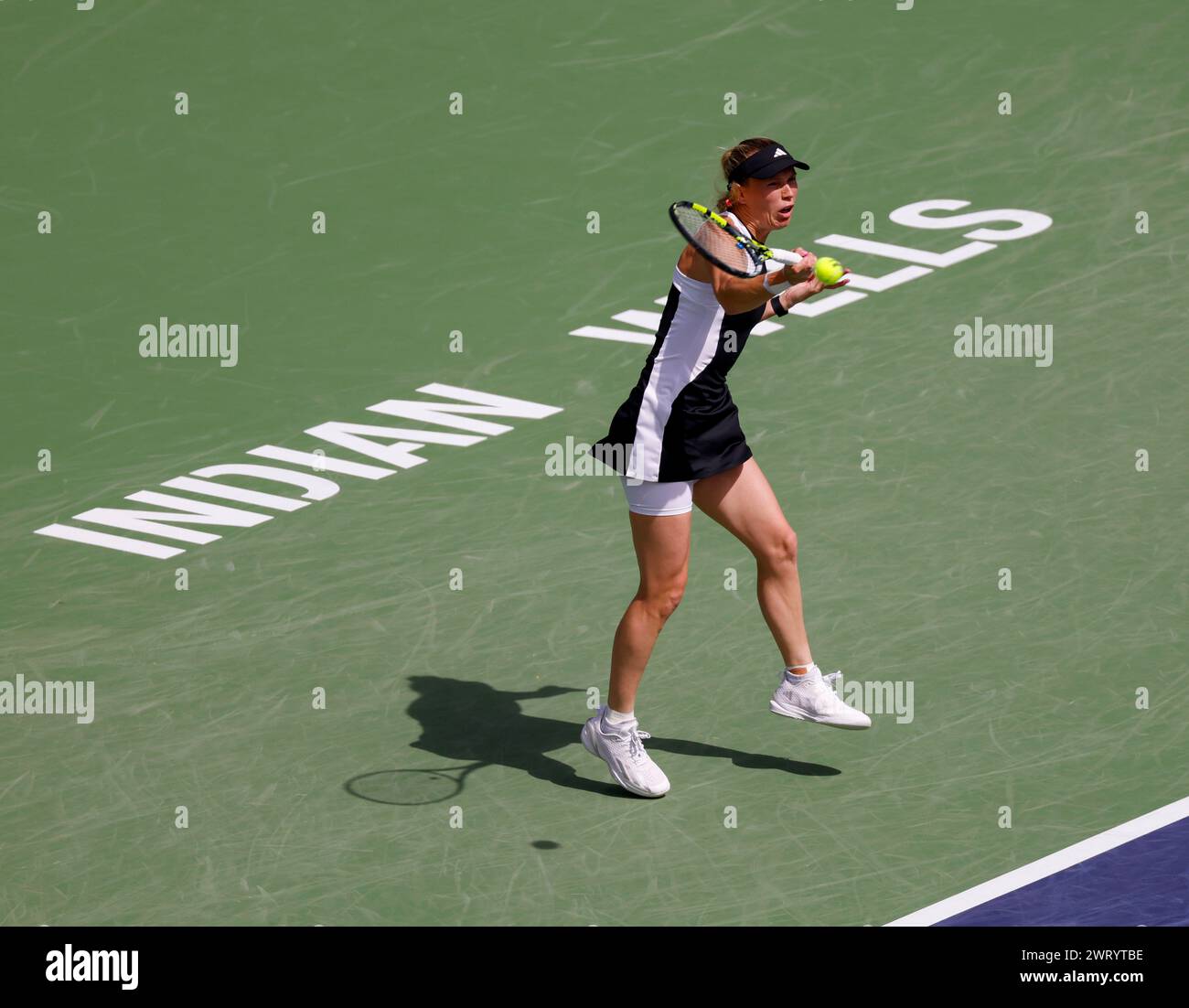 March 14, 2024 Caroline Wozniacki of Denmark plays a forehand against ...
