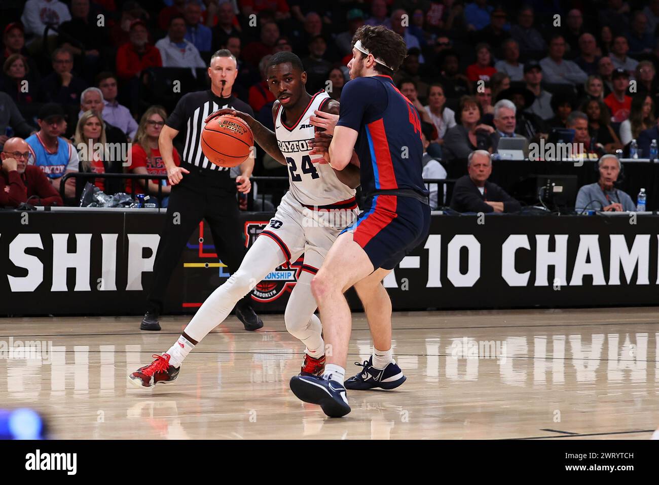 BROOKLYN, NY - MARCH 14: Kobe Elvis #24 of the Dayton Flyers drives ...
