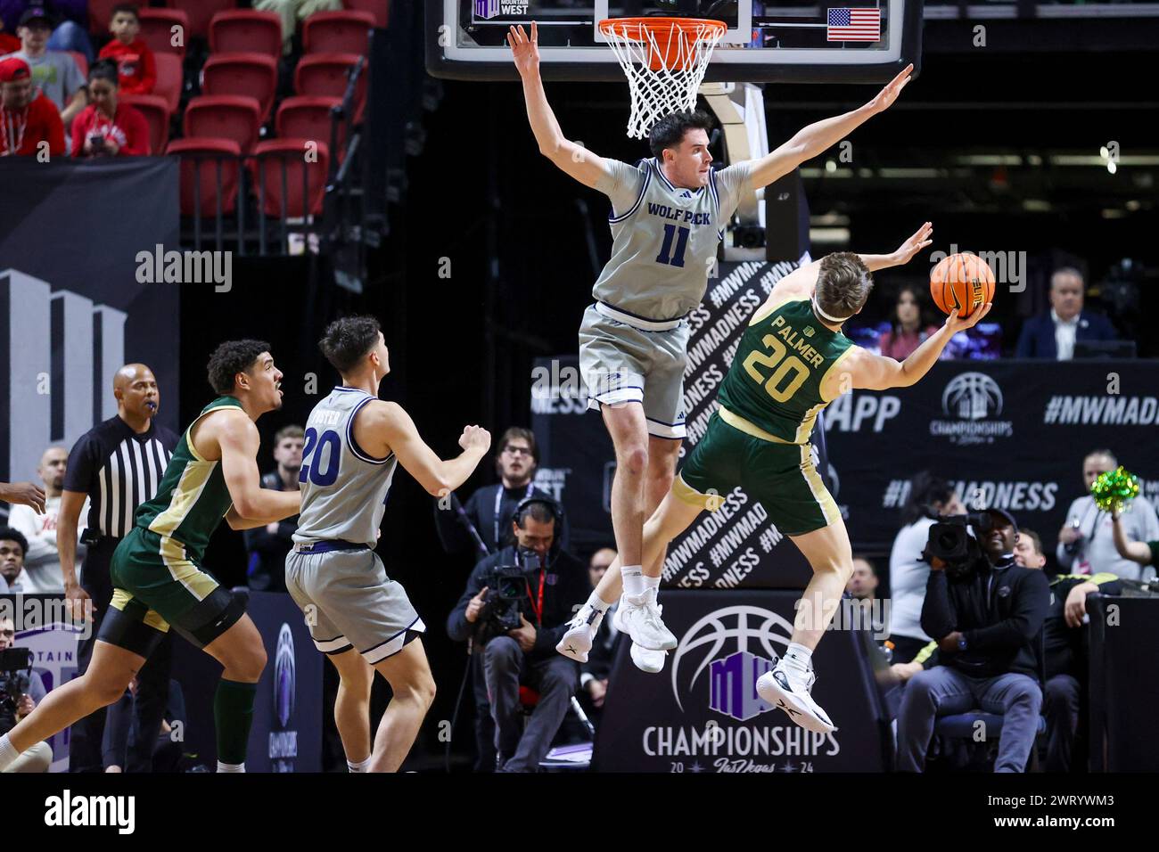 Nevada forward Nick Davidson (11) defends against Colorado State guard ...