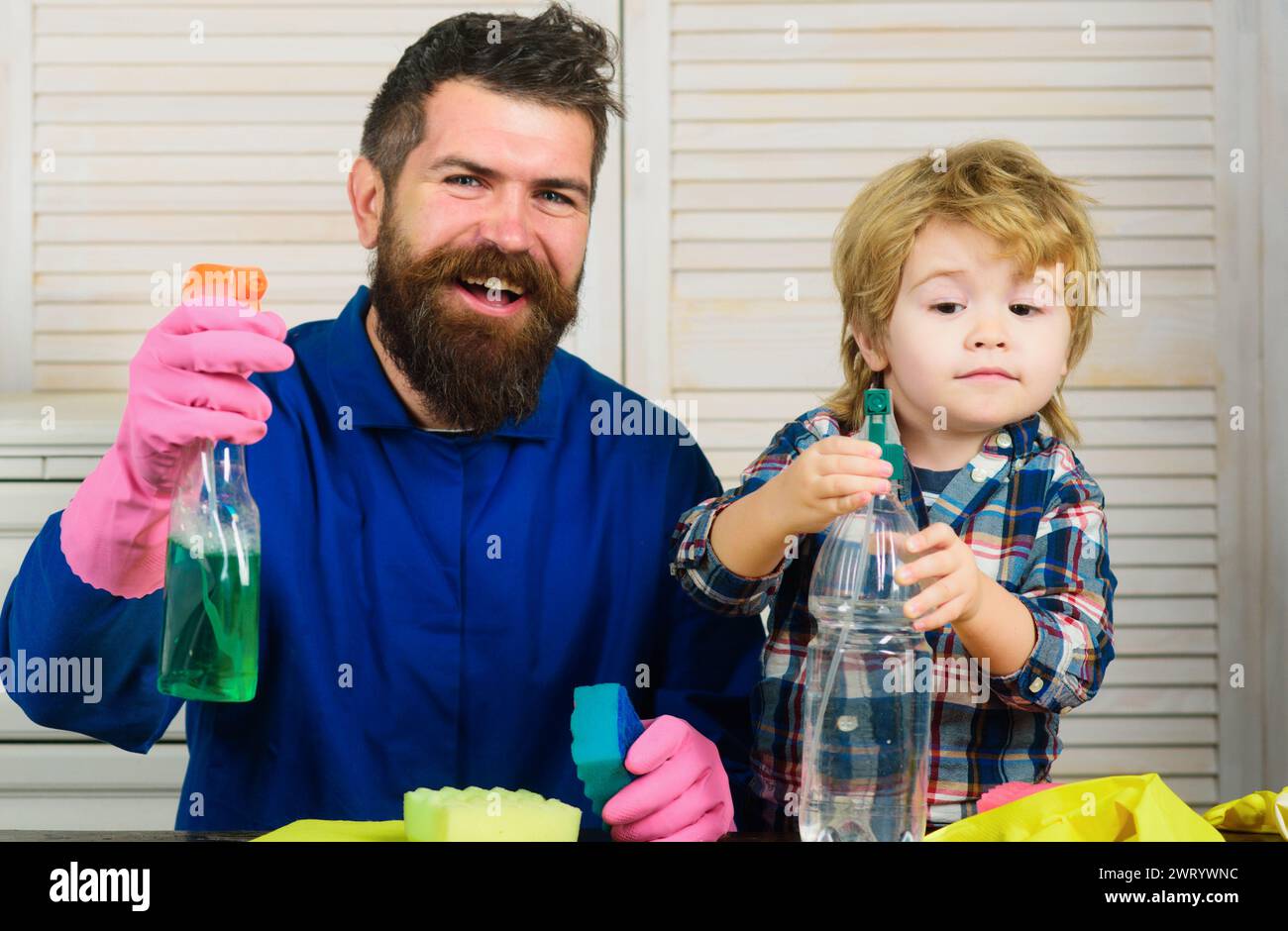 Father and son cleaning. Dad and child doing clean home Stock Photo - Alamy