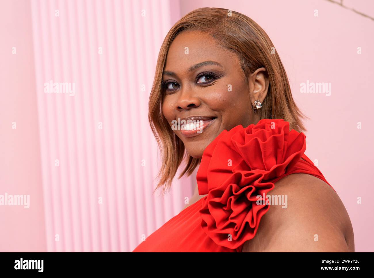 Amber Chardae Robinson, a cast member in "Palm Royale," poses at the ...