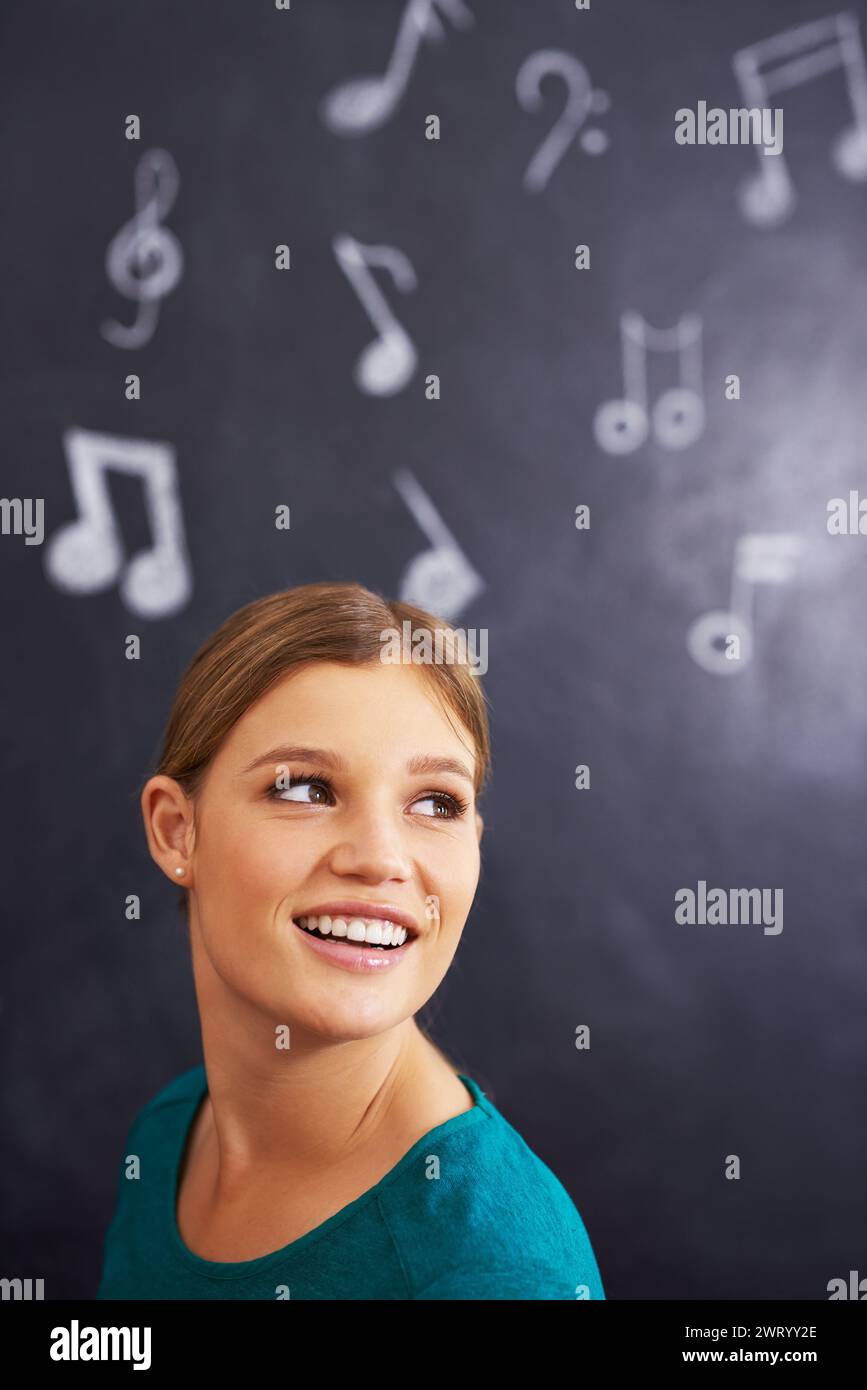 Music, notes and face of woman on chalkboard for learning, teaching and ...
