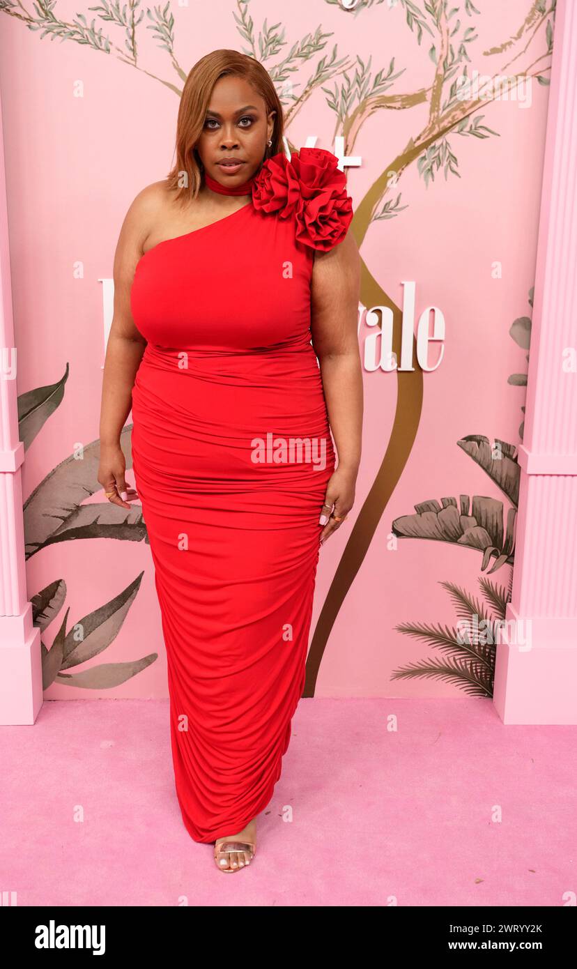 Amber Chardae Robinson, a cast member in "Palm Royale," poses at the ...