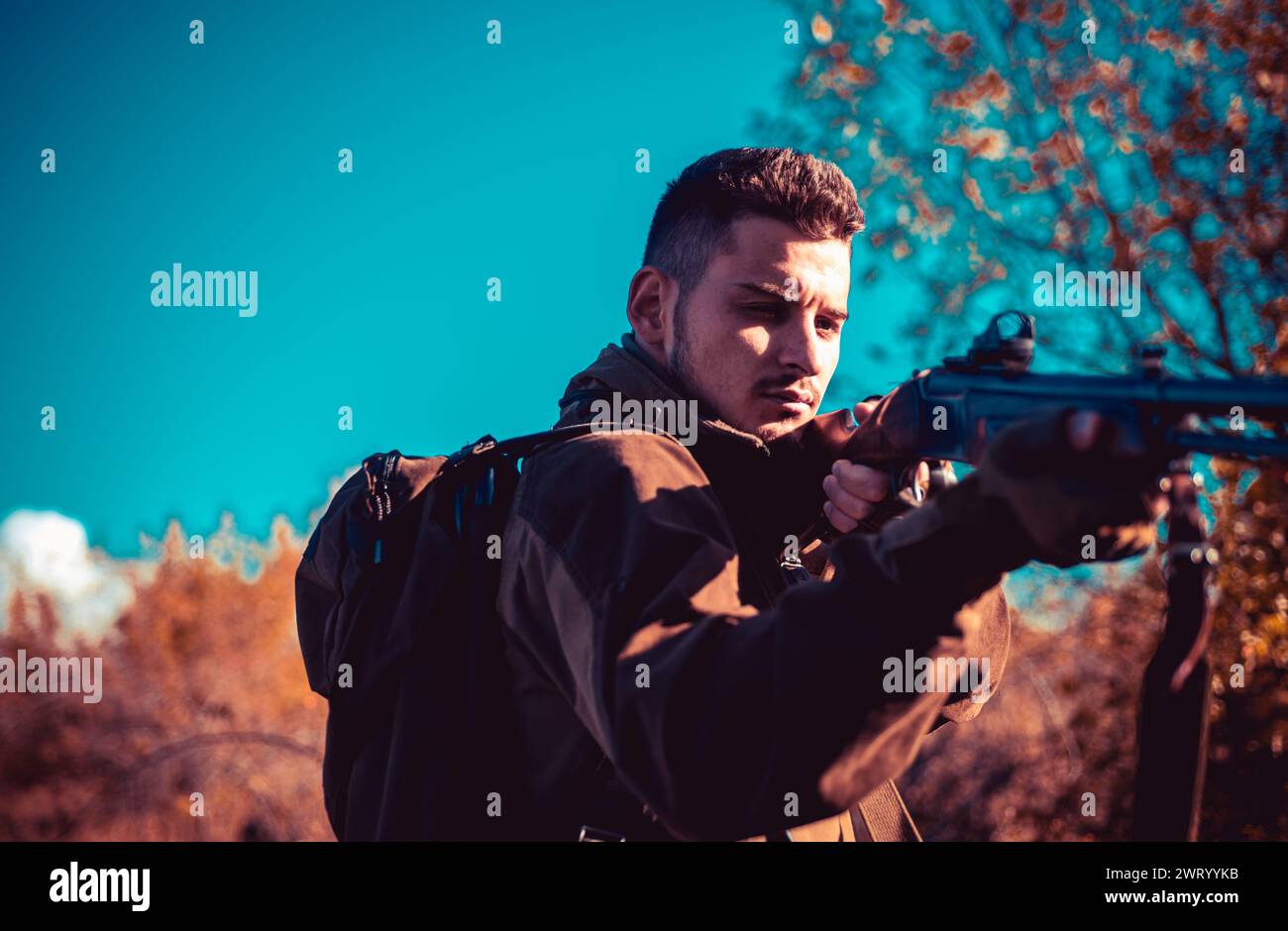 Hunter with shotgun gun on hunt. Hunter with Powerful Rifle with Scope ...