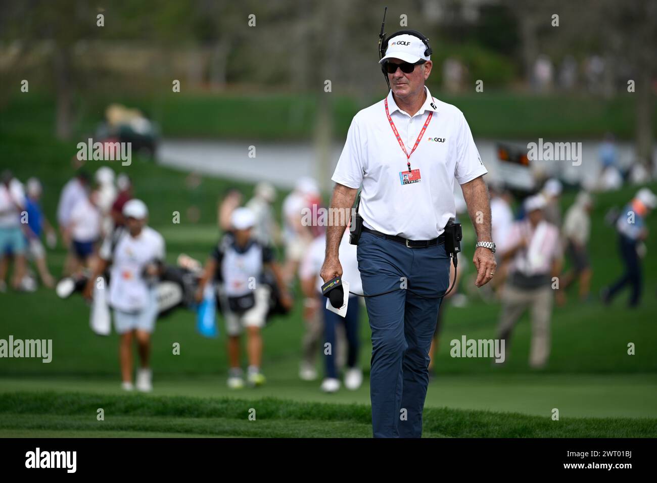 NBC golf analyst Curt Byrum walks on the 14th green during the second ...