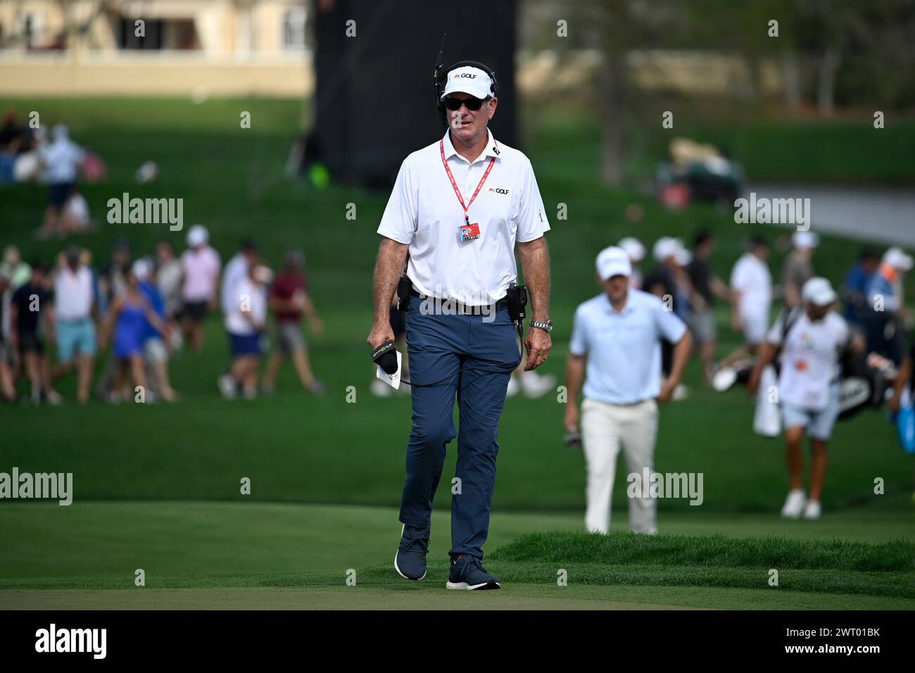 NBC golf analyst Curt Byrum walks on the 14th green during the second ...