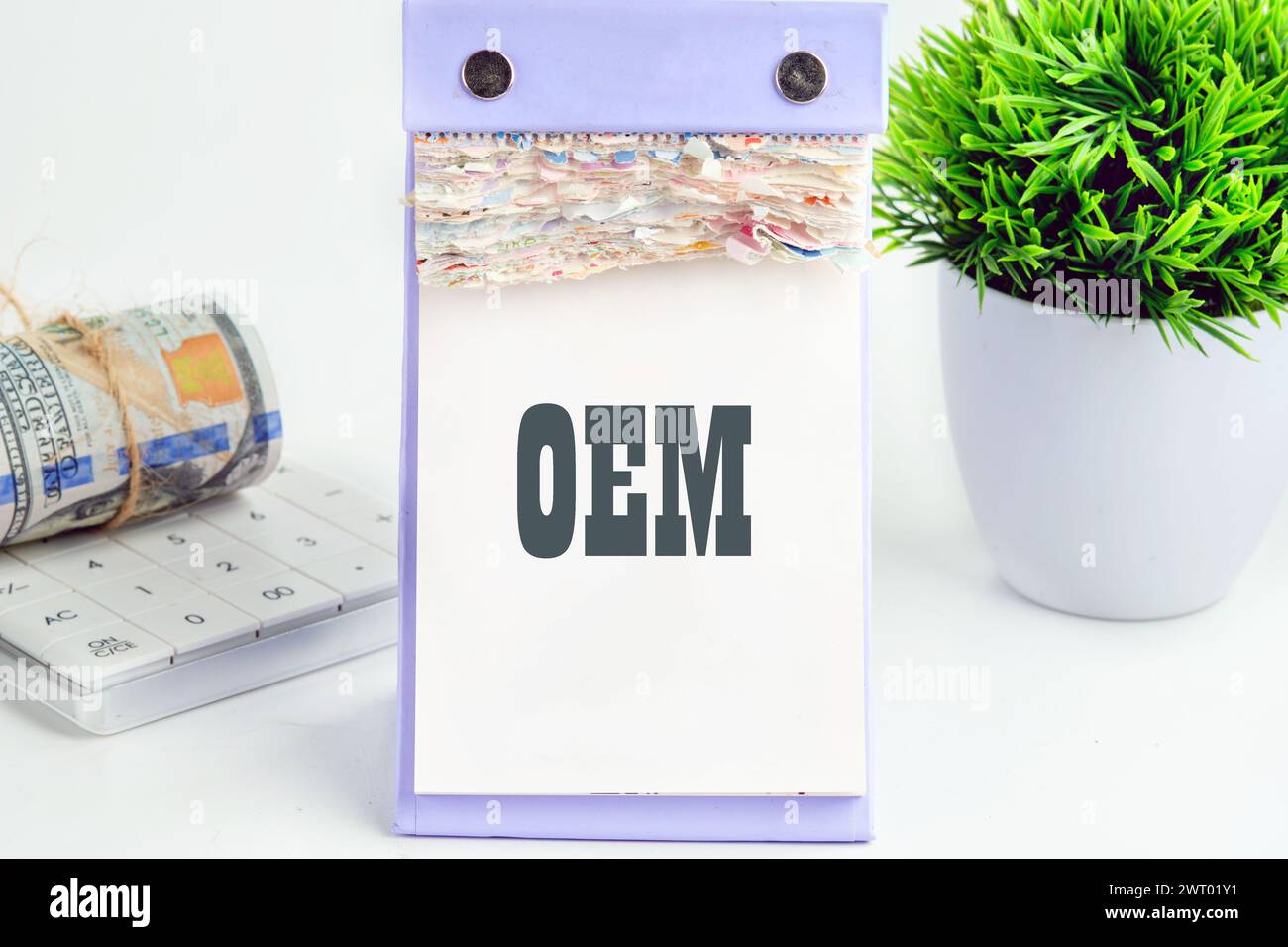 OEM original equipment manufacturer concept. Text on a piece of a ...