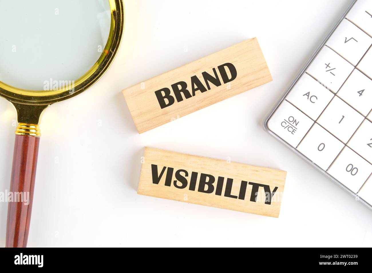 Words Brand visibility on wooden blocks on a white background next to a ...