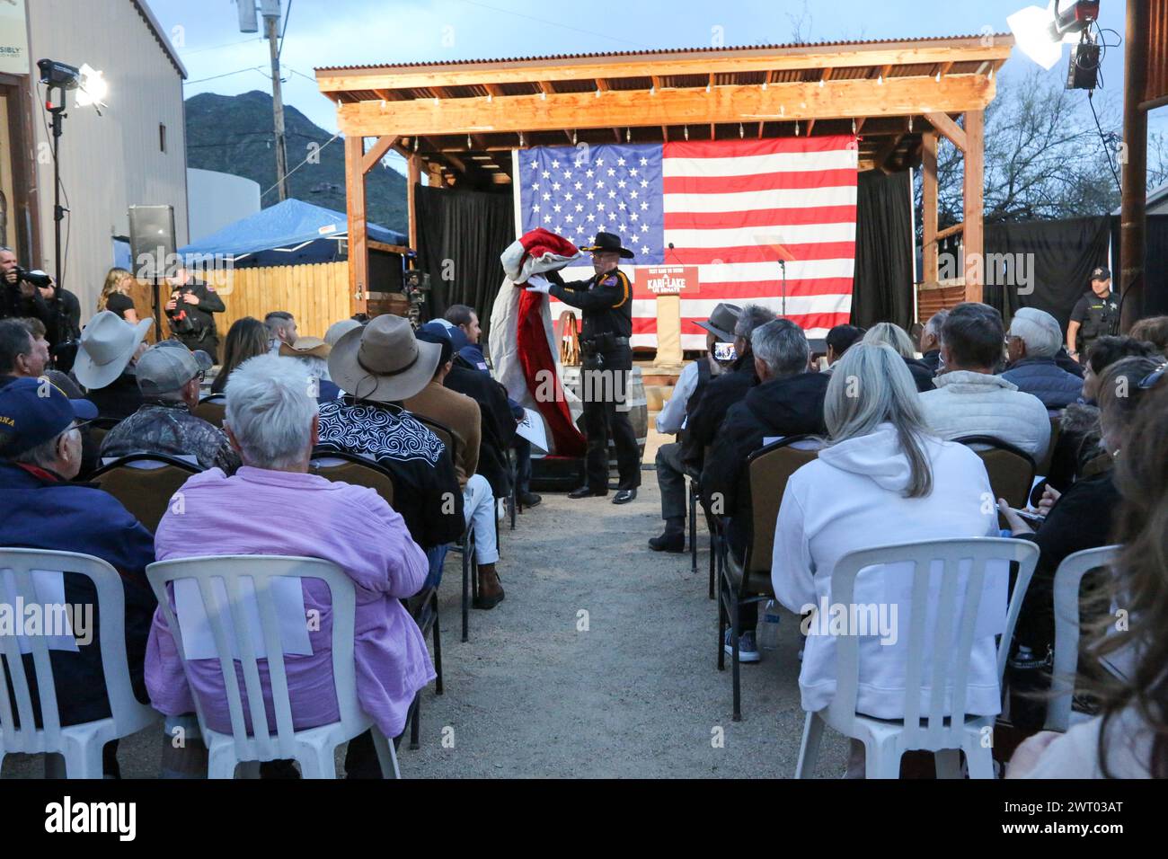 The flag from the US Arizona gets unfurled amongst the audience before ...